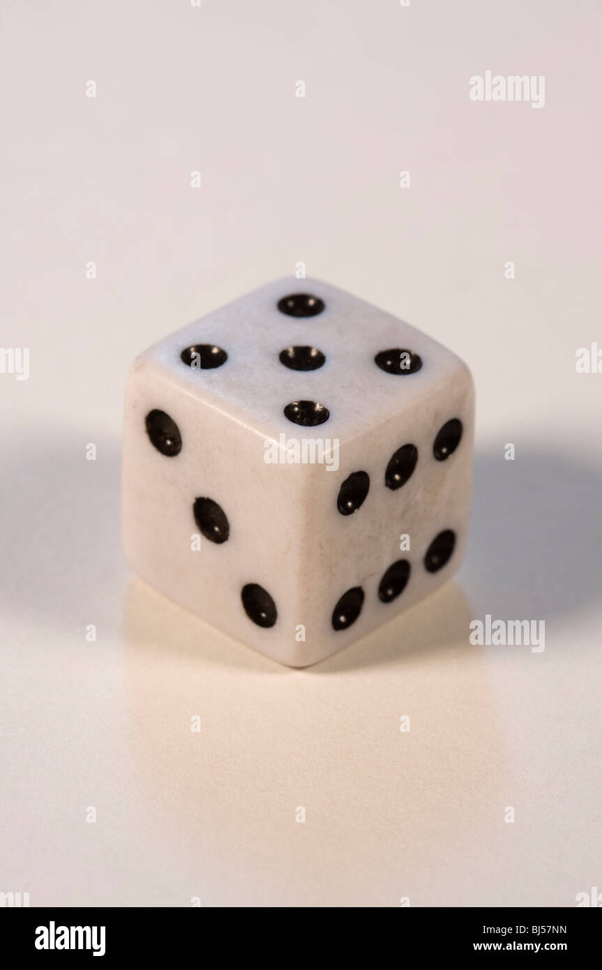 Single White Die on White Background Showing Number 5 Stock Photo - Alamy