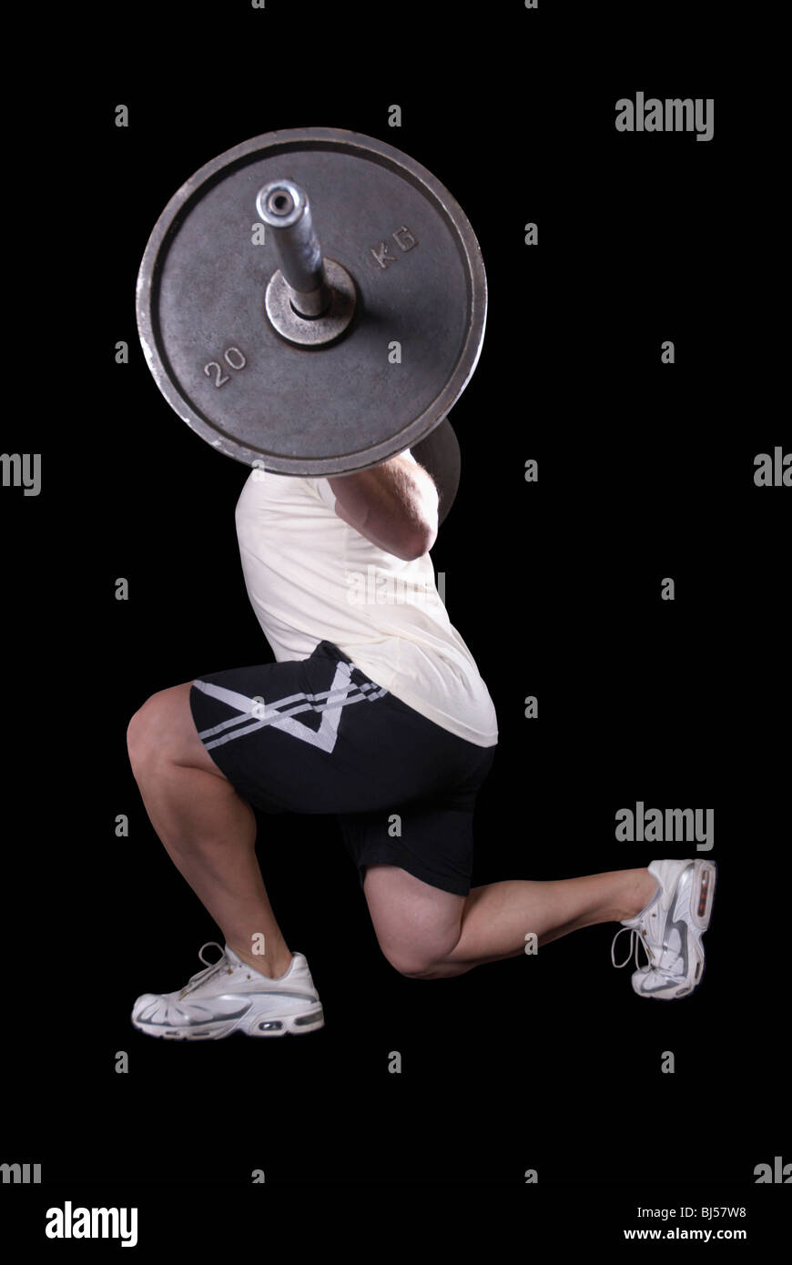 bodybuilder doing lunges Stock Photo - Alamy