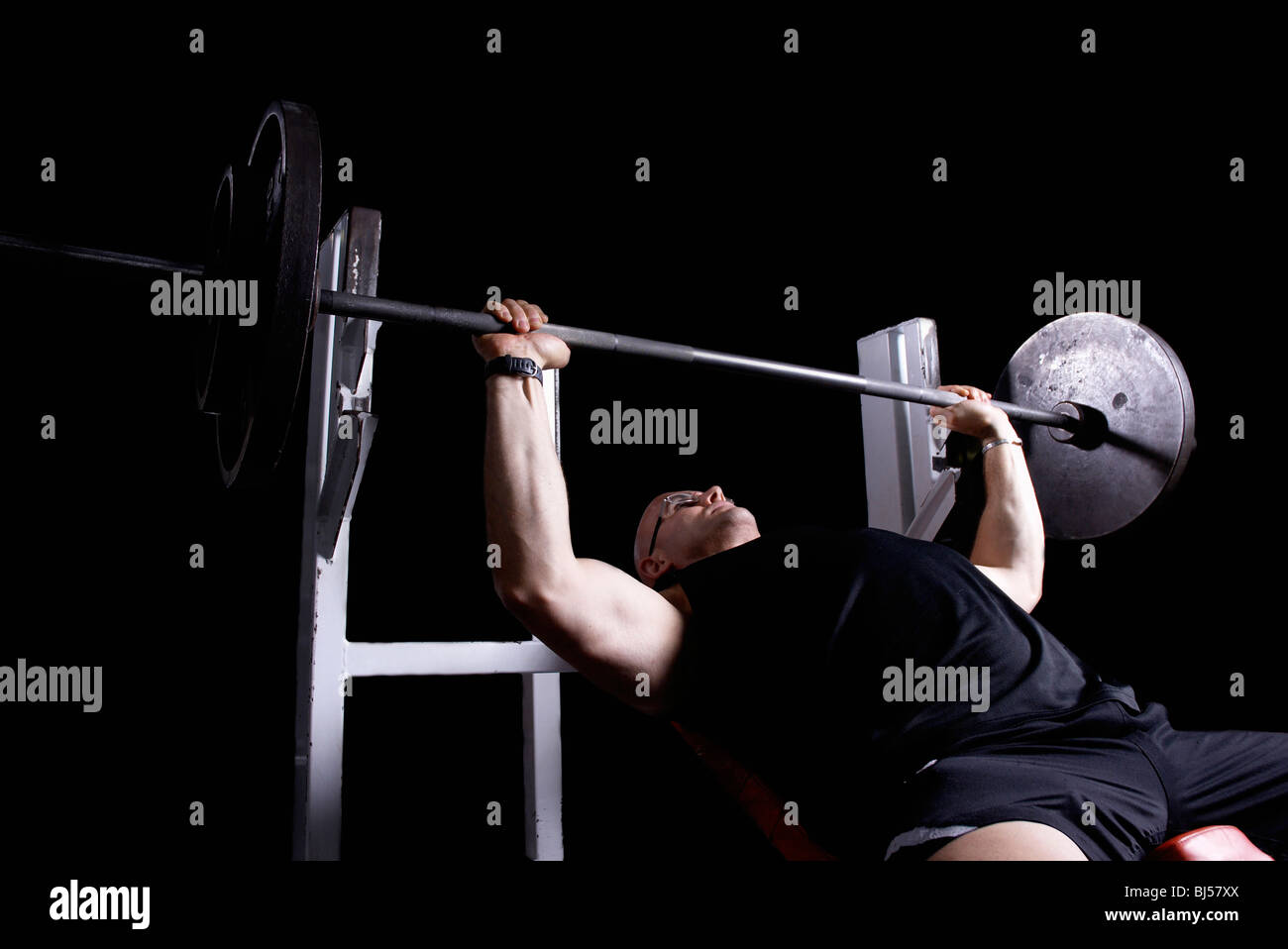 bodybuilder doing bench press Stock Photo - Alamy