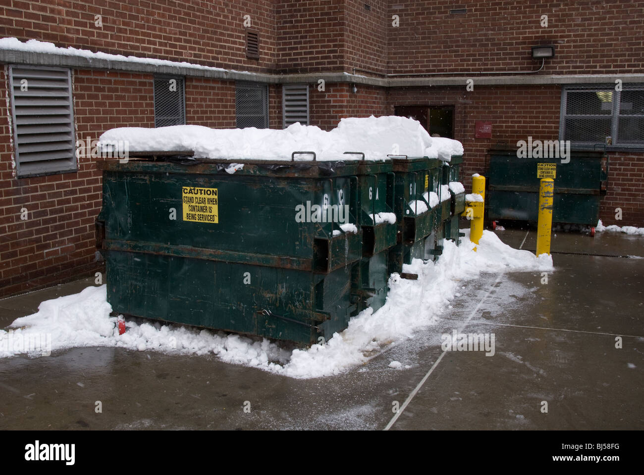 Dumpsters outside an apartment building in New York on Friday, February ...