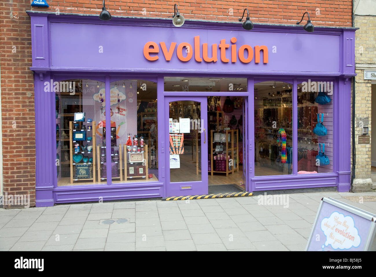 Evolution shop exterior street Stock Photo - Alamy