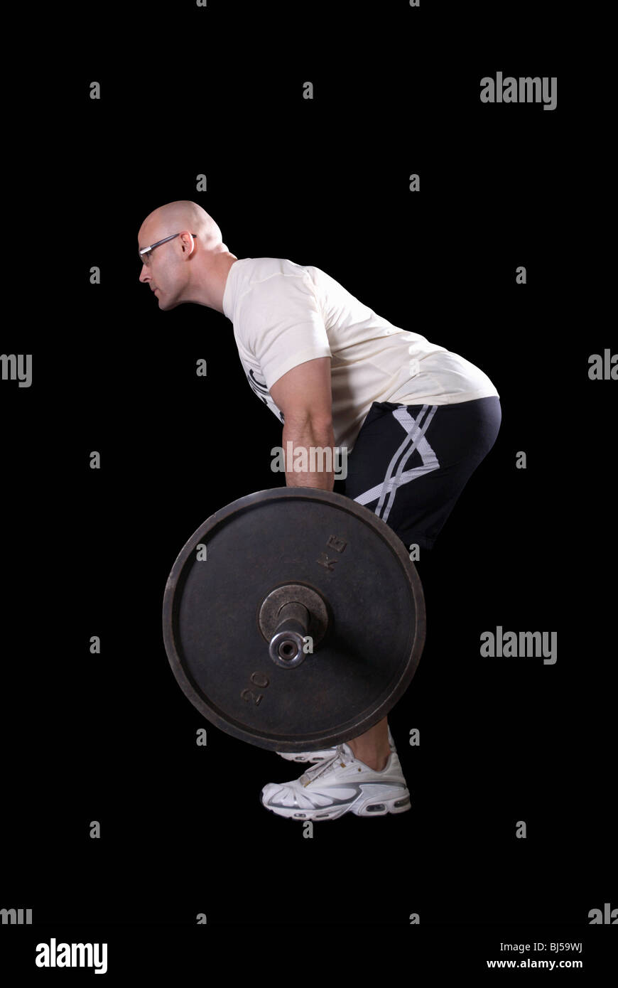 bodybuilder lifting weight Stock Photo - Alamy