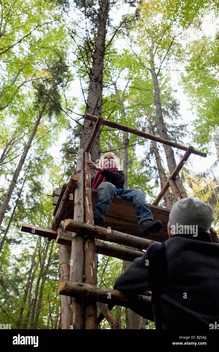 Boy on a perch Stock Photo - Alamy