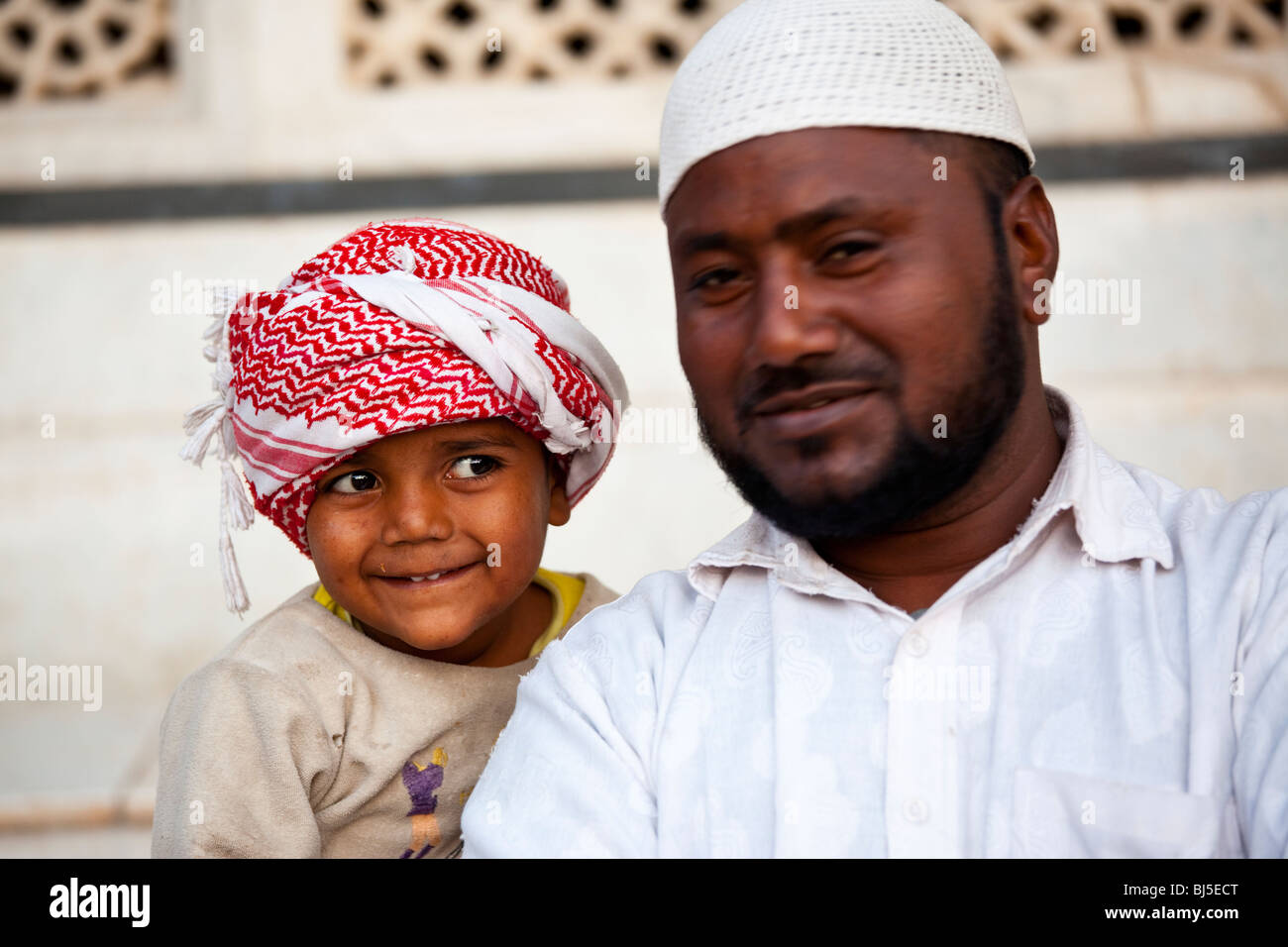 Muslim man and child at the Friday Mosque in Fatehpur Sikri India Stock ...