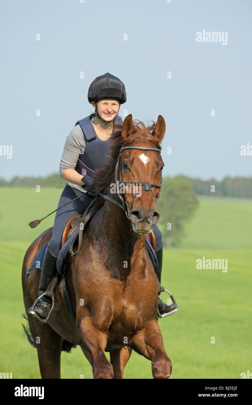 Horse rider riding woman girl gallop hi-res stock photography and ...