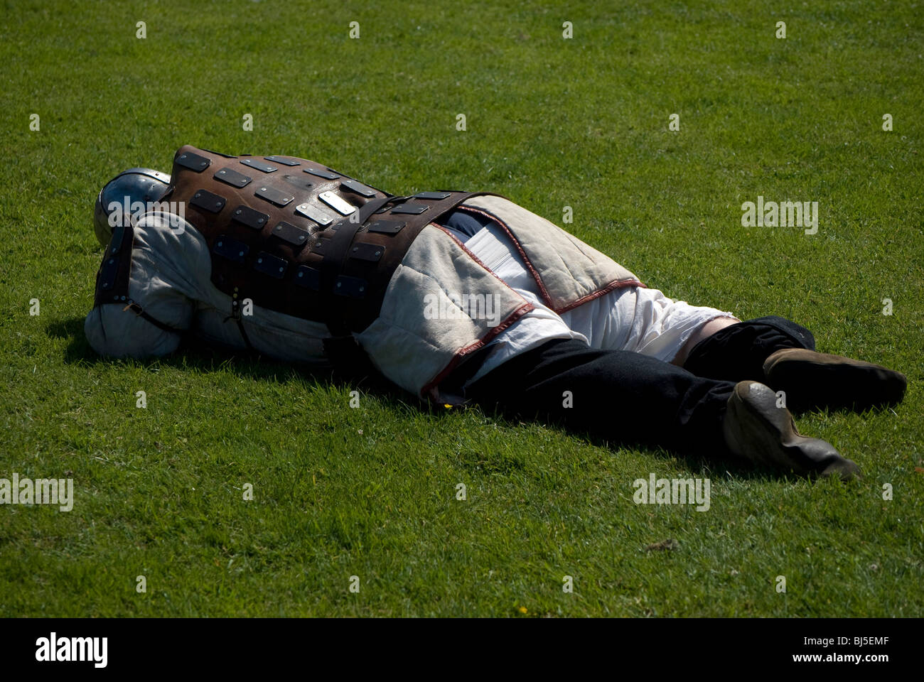Soldier playing dead at a historical event at Linlithgow, West Lothian ...