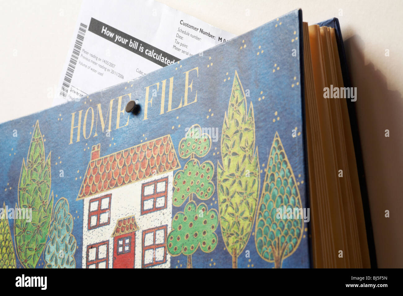 Homefile concertina folder to file away household bills Stock Photo - Alamy
