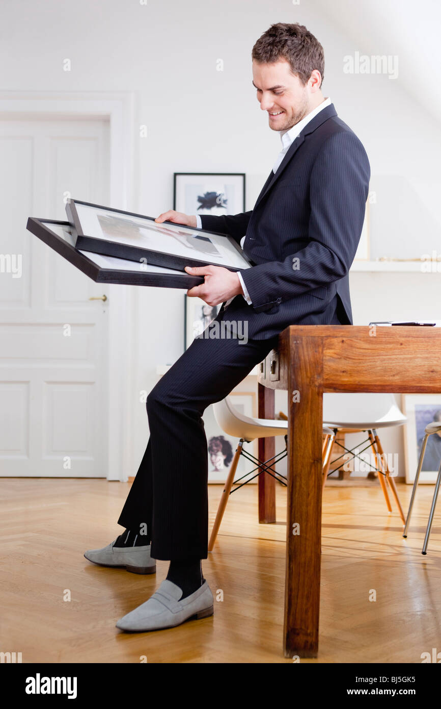 man viewing paintings Stock Photo - Alamy