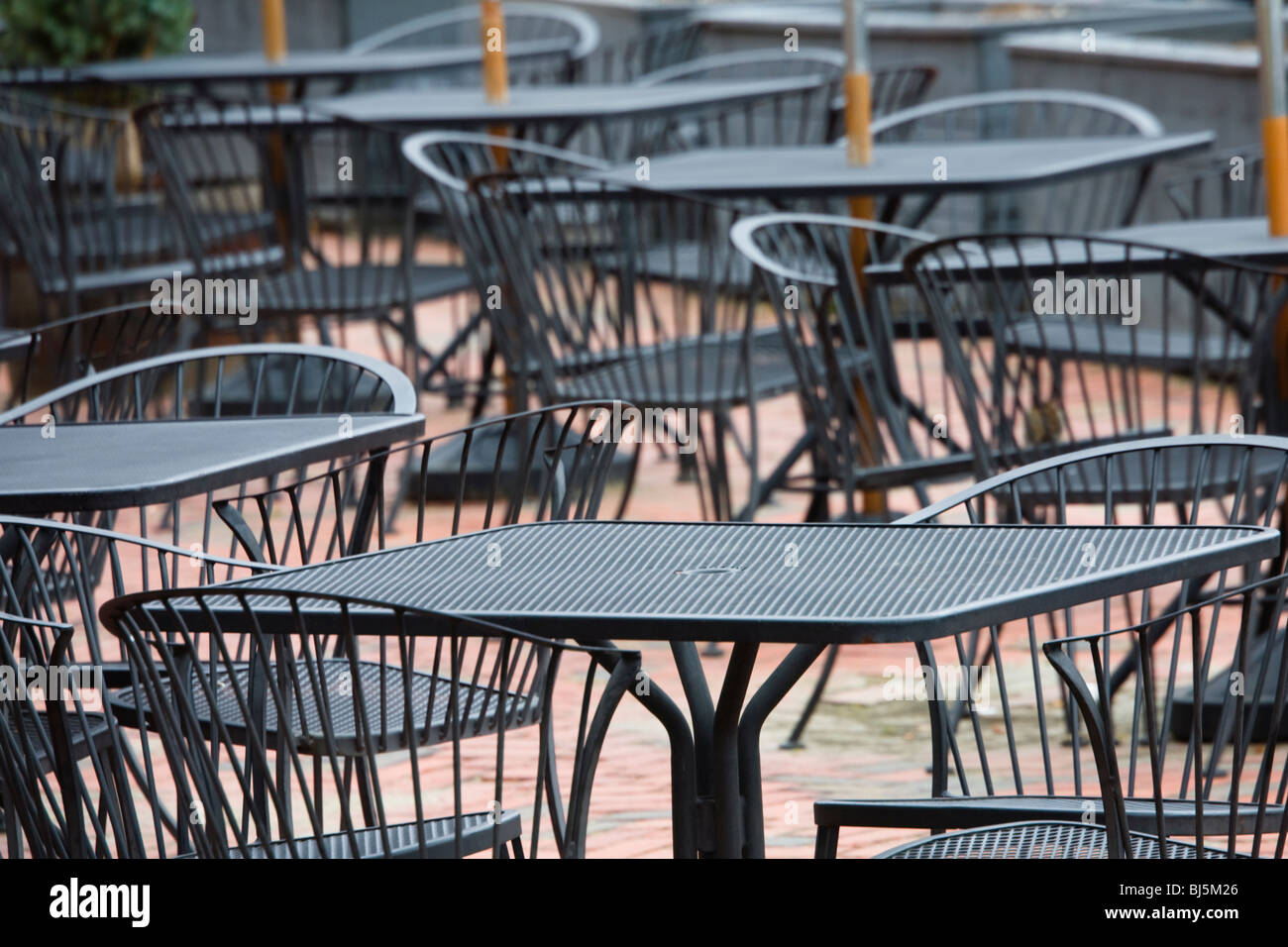 Empty tables and chairs Stock Photo - Alamy