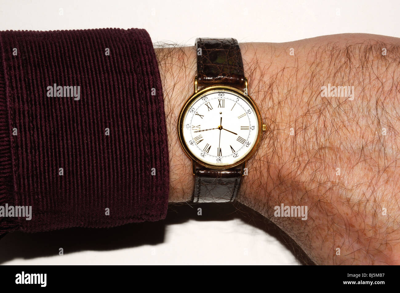 Expensive wristwatch on man's arm Stock Photo - Alamy