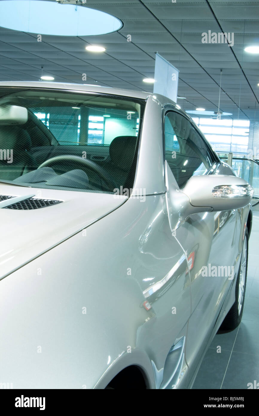 mercedes benz sports car close-up at cars dealership showroom, front ...