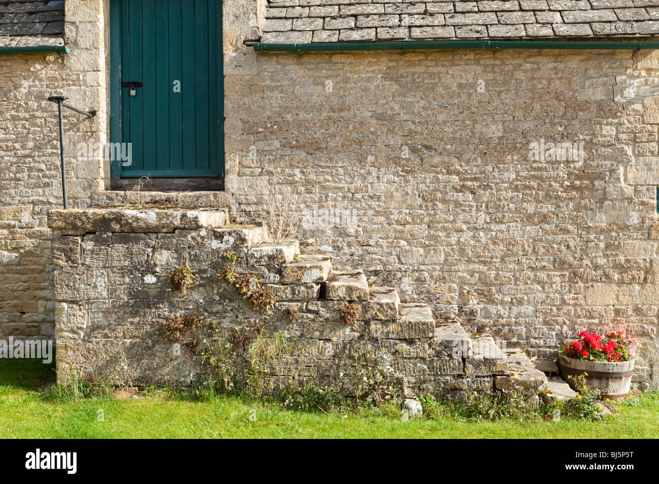 External steps on a stone barn in the Cotswold village of Yanworth ...