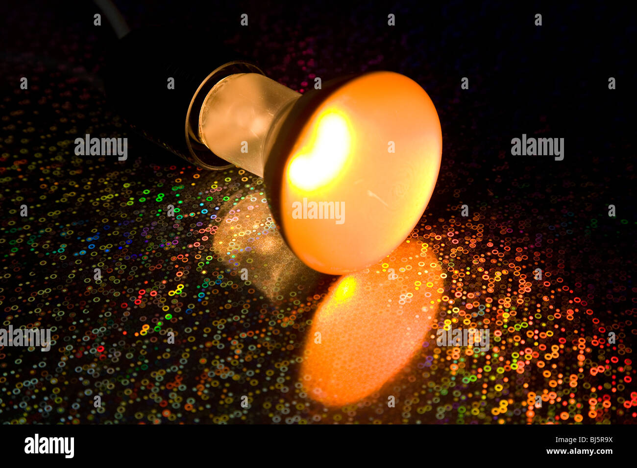Orange spotlight household lightbulb Stock Photo - Alamy