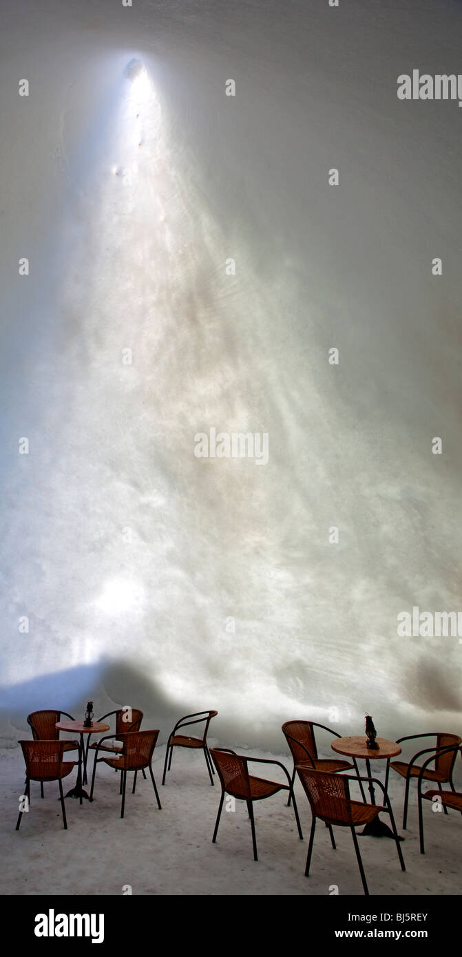 The interior of a snow cafe made of compacted snow and ice in Finland ...