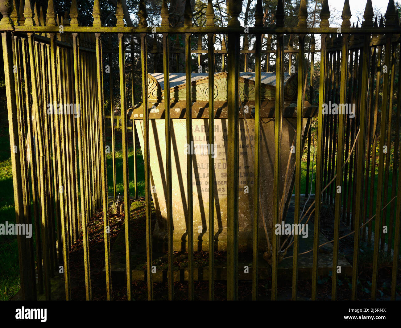 gravestones lit by the sun in a country cemetery Stock Photo - Alamy