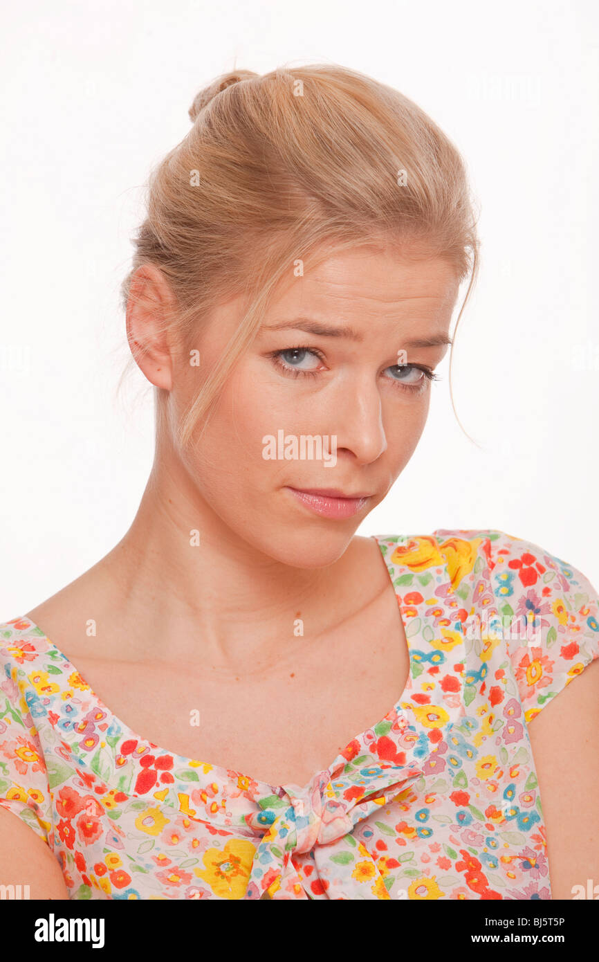 Young woman looking anxiously Stock Photo - Alamy