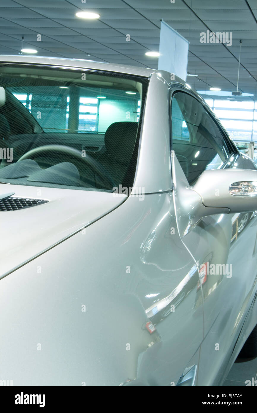 mercedes benz sports car close-up at cars dealership showroom, front ...