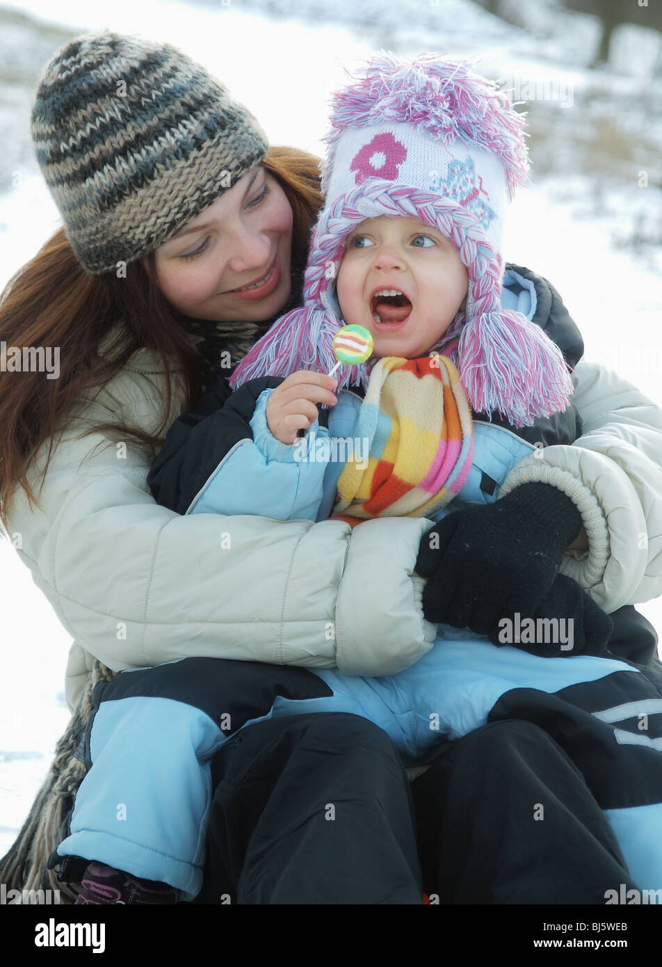 Mother and child in the winter Stock Photo - Alamy