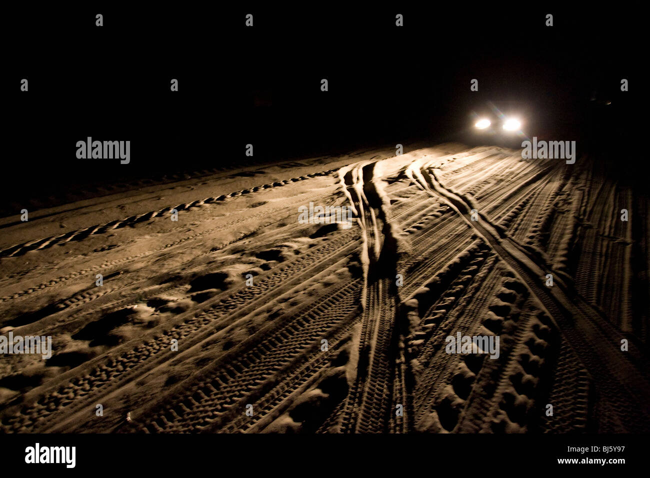 Country road at night, lightened by headlights Stock Photo - Alamy