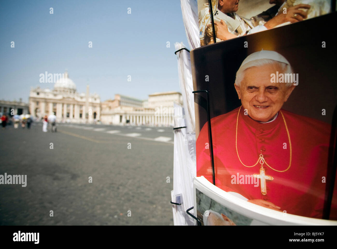 Postcard stand with Saint Peter's Basilica in the background, Vatican ...
