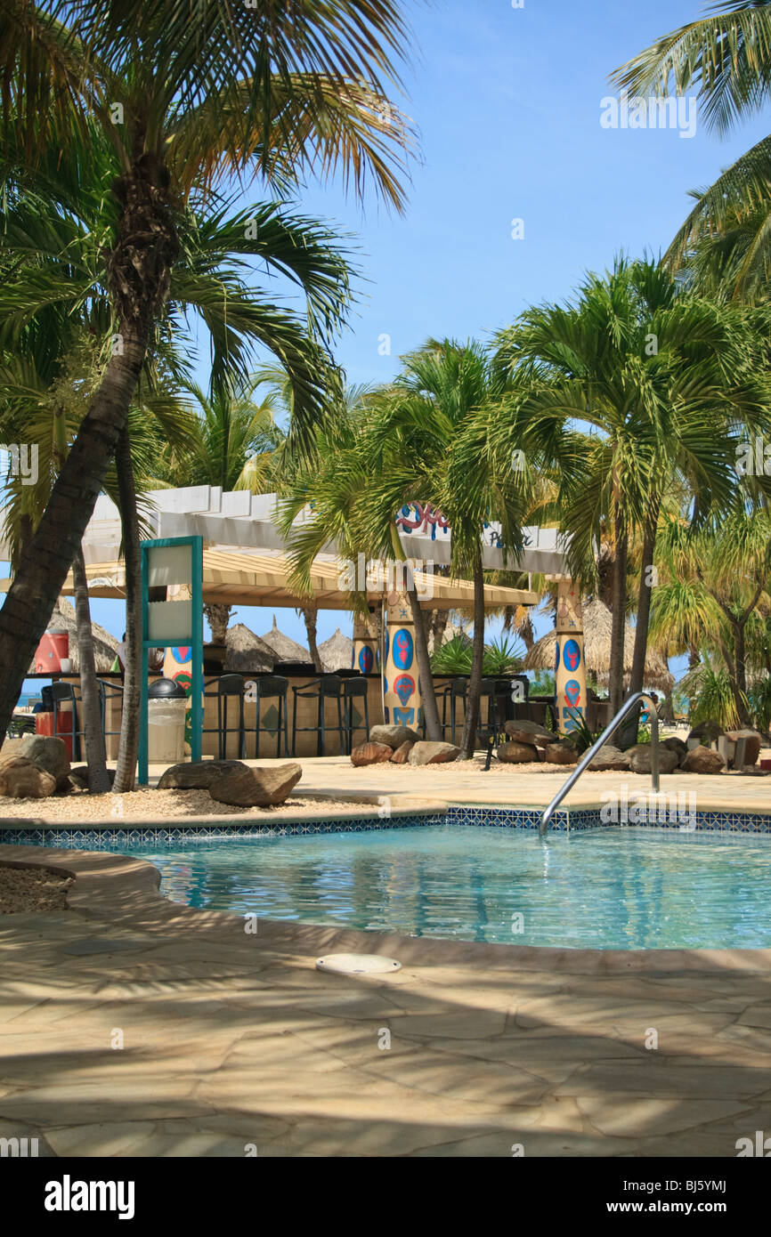 Pool area at the Divi Phoenix Beach Resort Aruba Stock Photo - Alamy