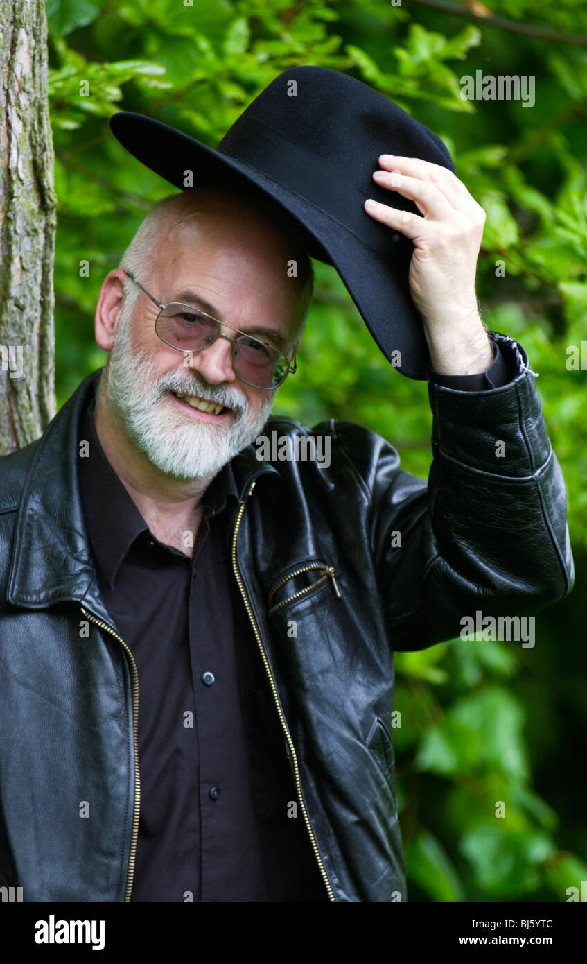 Terry Pratchett wearing his trademark black fedora hat pictured in ...