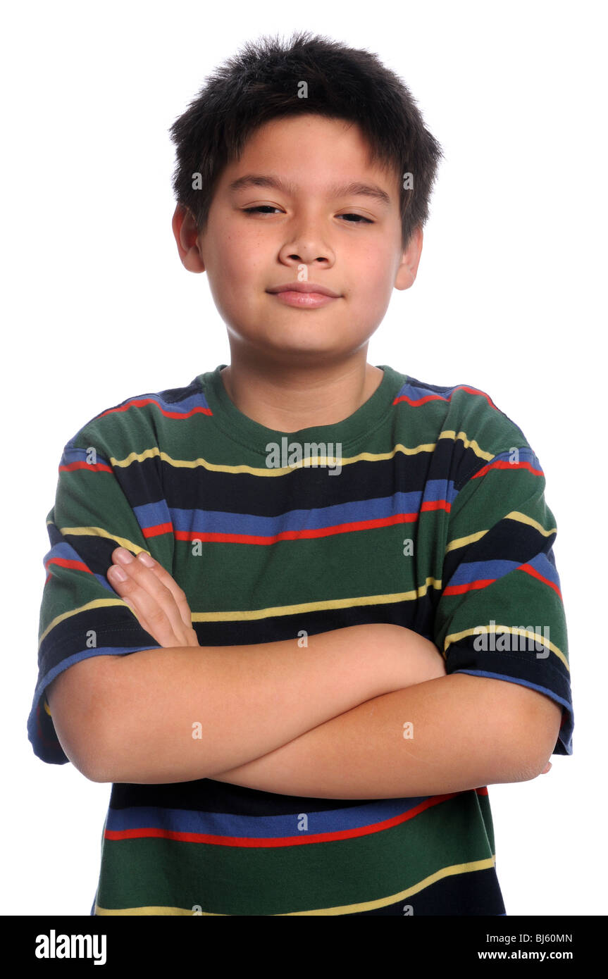 Young boy with arms crossed isolated over white background Stock Photo ...