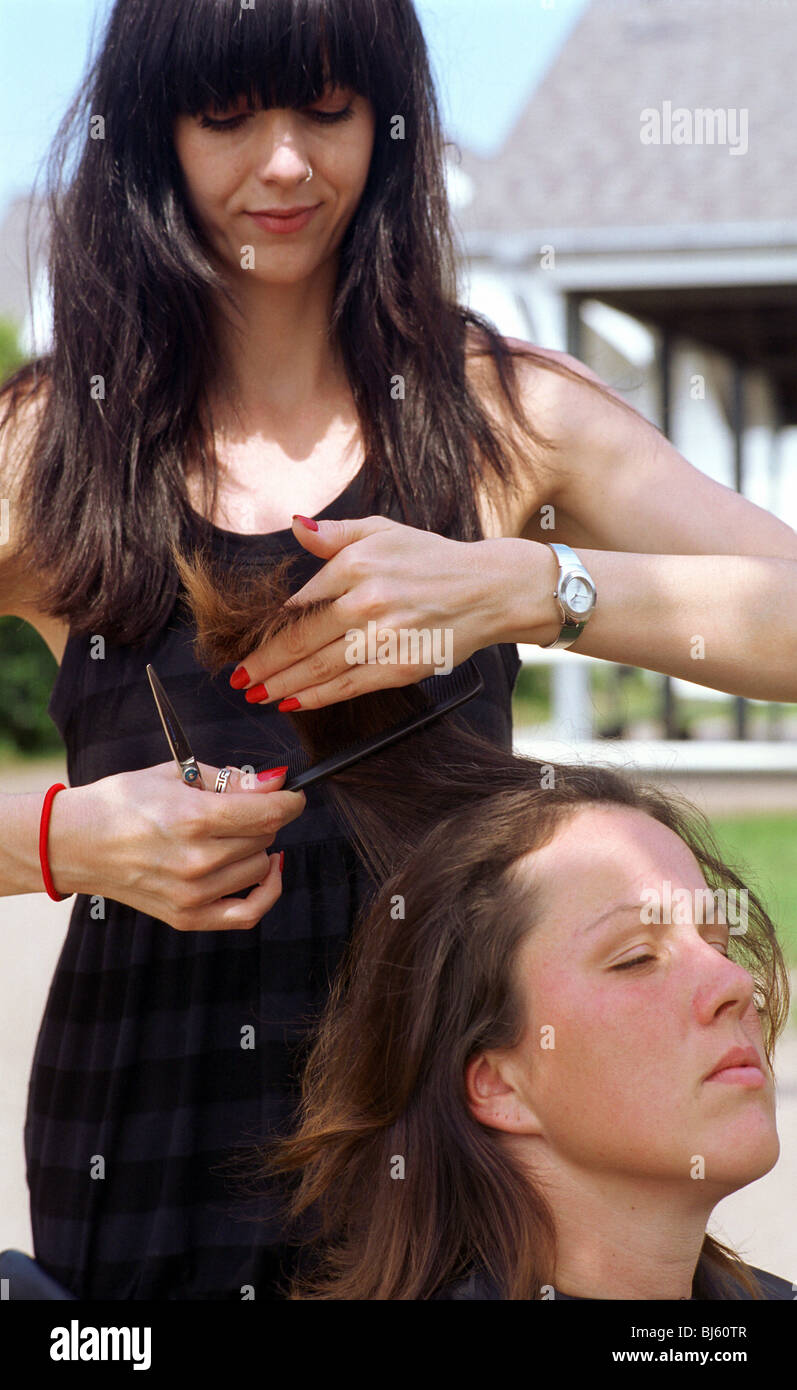 Female mobile hairdresser cutting hi-res stock photography and images ...