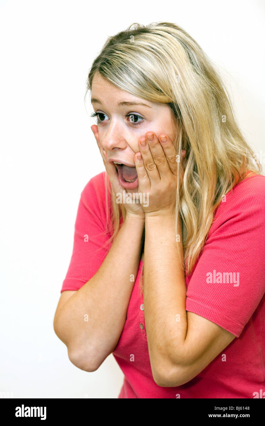 A teenage girl with a shocked look of horror expression, UK Stock Photo ...