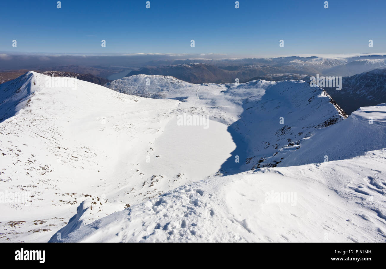 Winter View over the frozen Red Tarn from Helvellyn, Catstye Cam on the ...