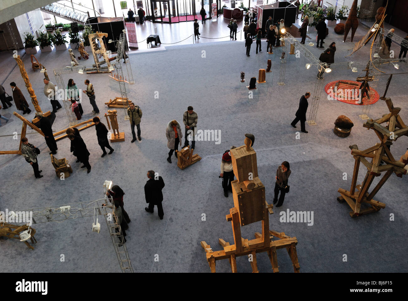 Visitors view sculptures displayed at a Great Sculpture Exhibition on ... Visitors view sculptures displayed at a Great Sculpture Exhibition on ...