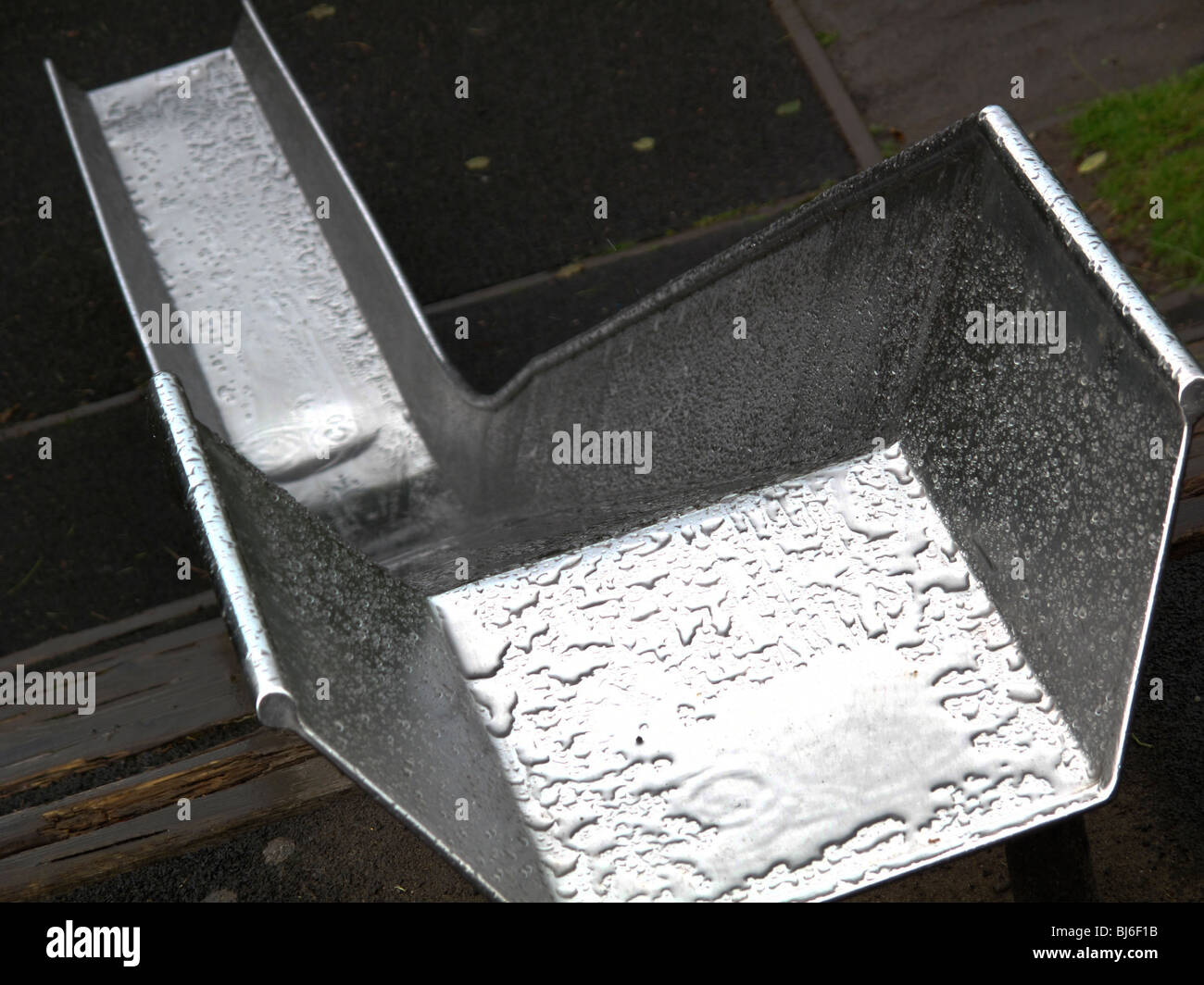 View from top of child's chute in rain Stock Photo - Alamy