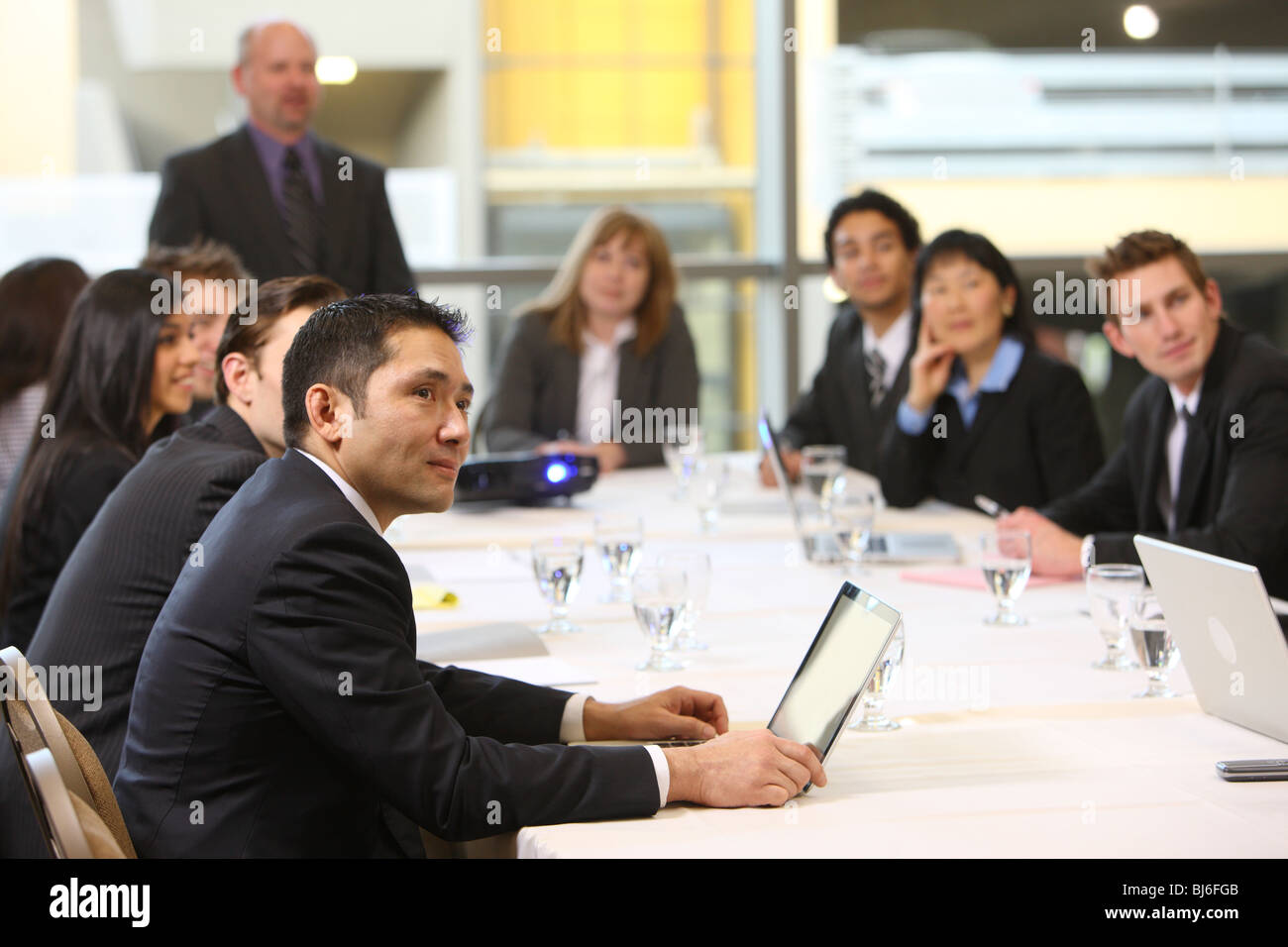 Business people in board room meeting Stock Photo - Alamy