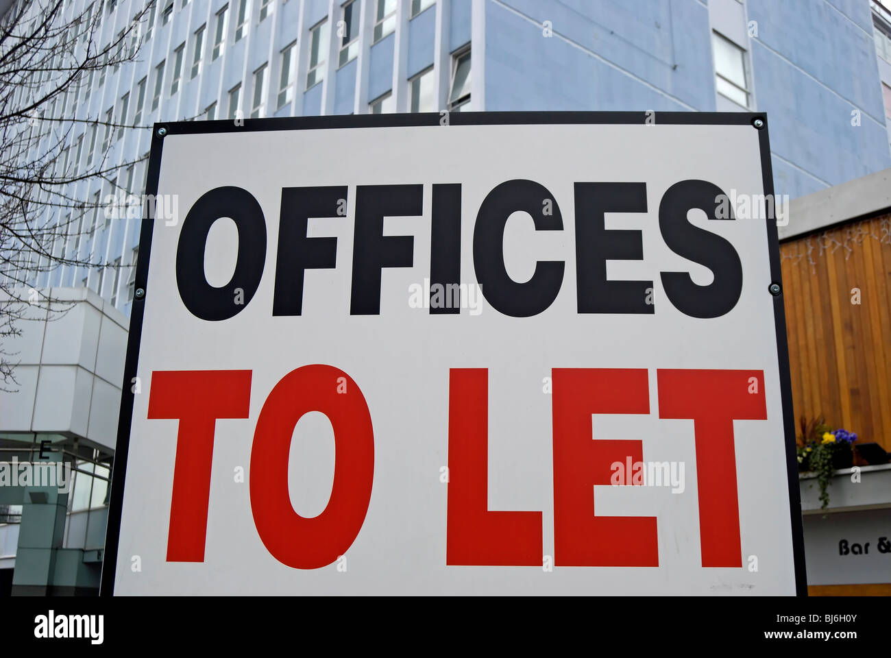 offices to let sign with office block in background, in twickenham ...