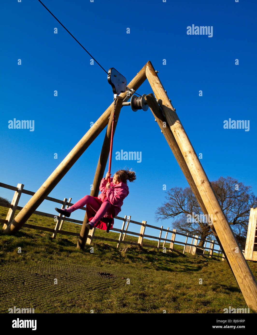 Children playing behind a fence hi-res stock photography and images - Alamy