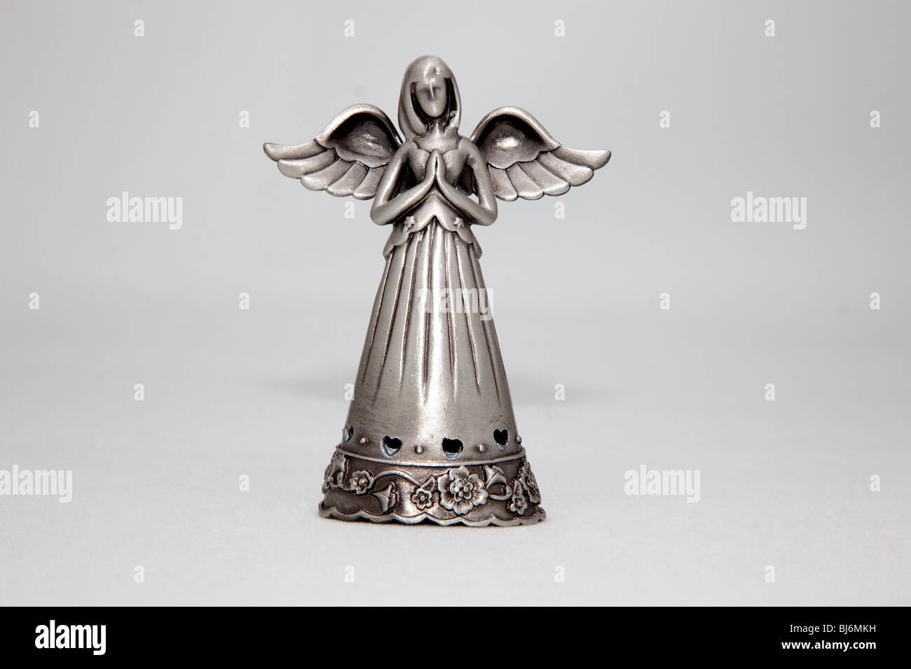 Artistic pewter angel praying. St Paul Minnesota USA Stock Photo - Alamy