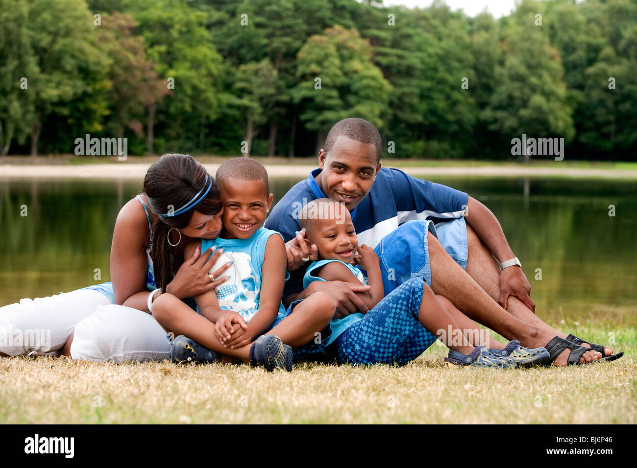 Happy black family enjoying their free day Stock Photo - Alamy
