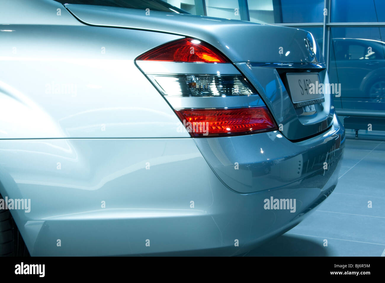 Back of luxury car, side view, tail light, mercedes benz dealership ...