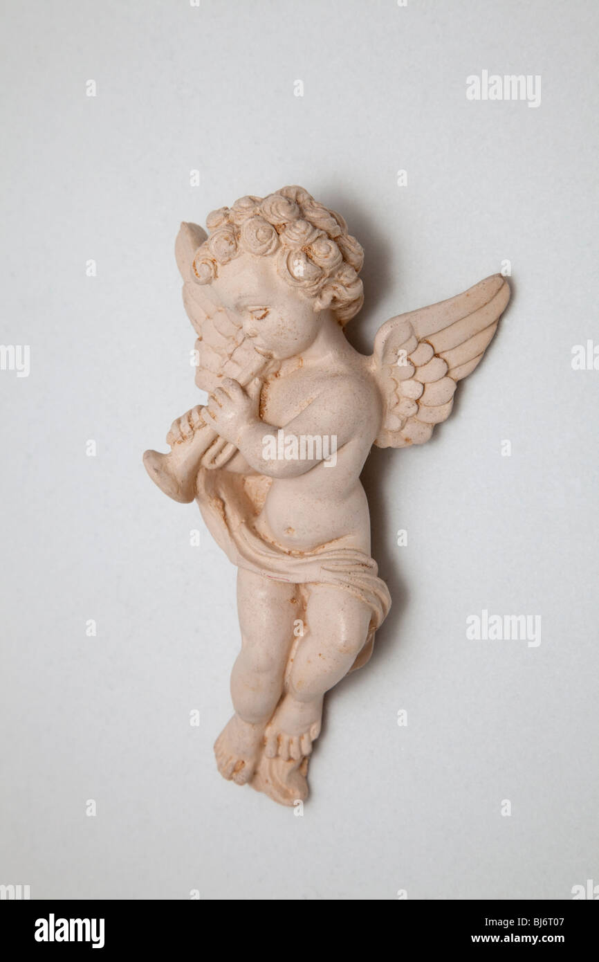 Angel blowing trumpet hi-res stock photography and images - Alamy