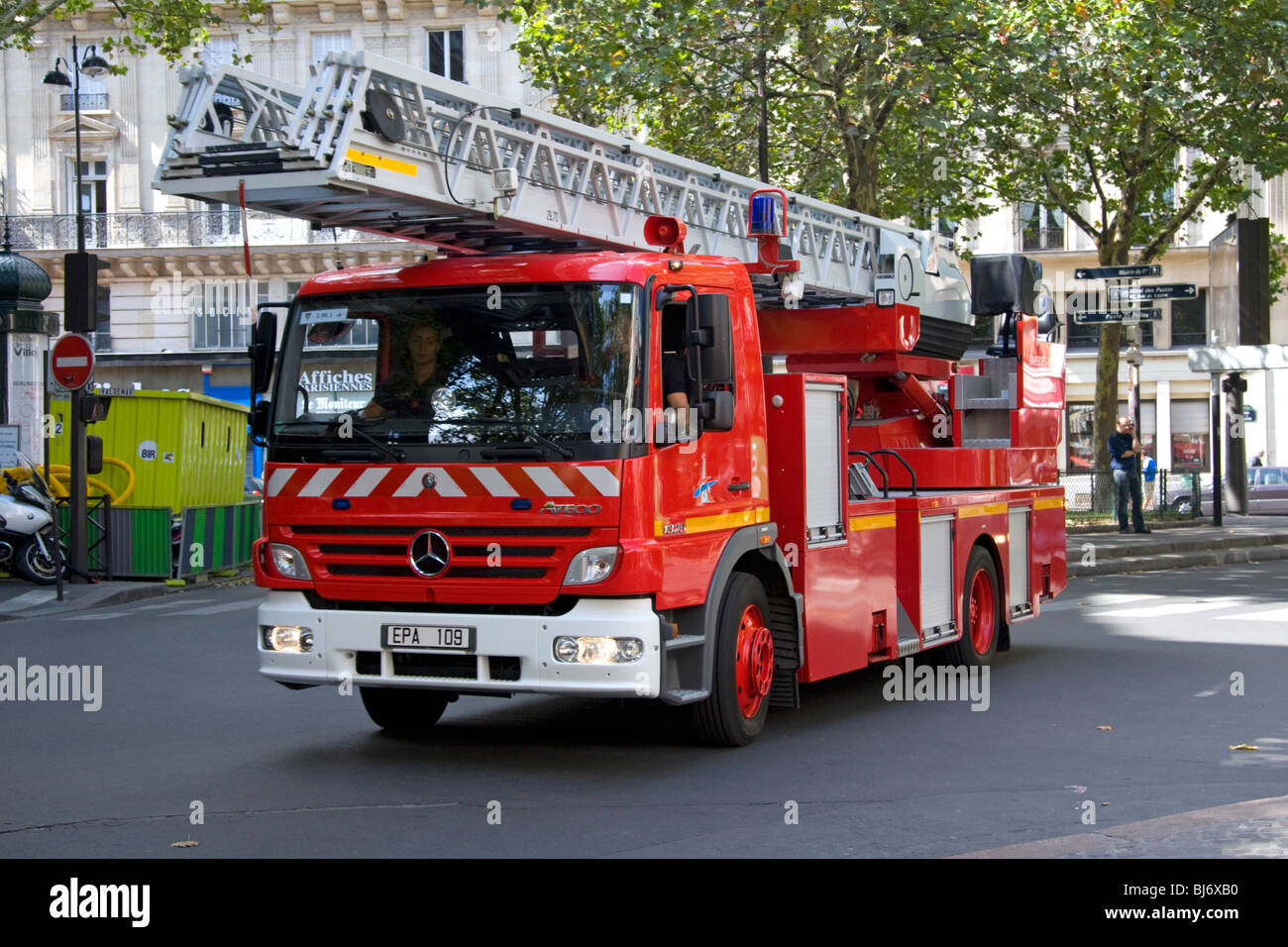French fire department ladder truck in Paris, France Stock Photo - Alamy