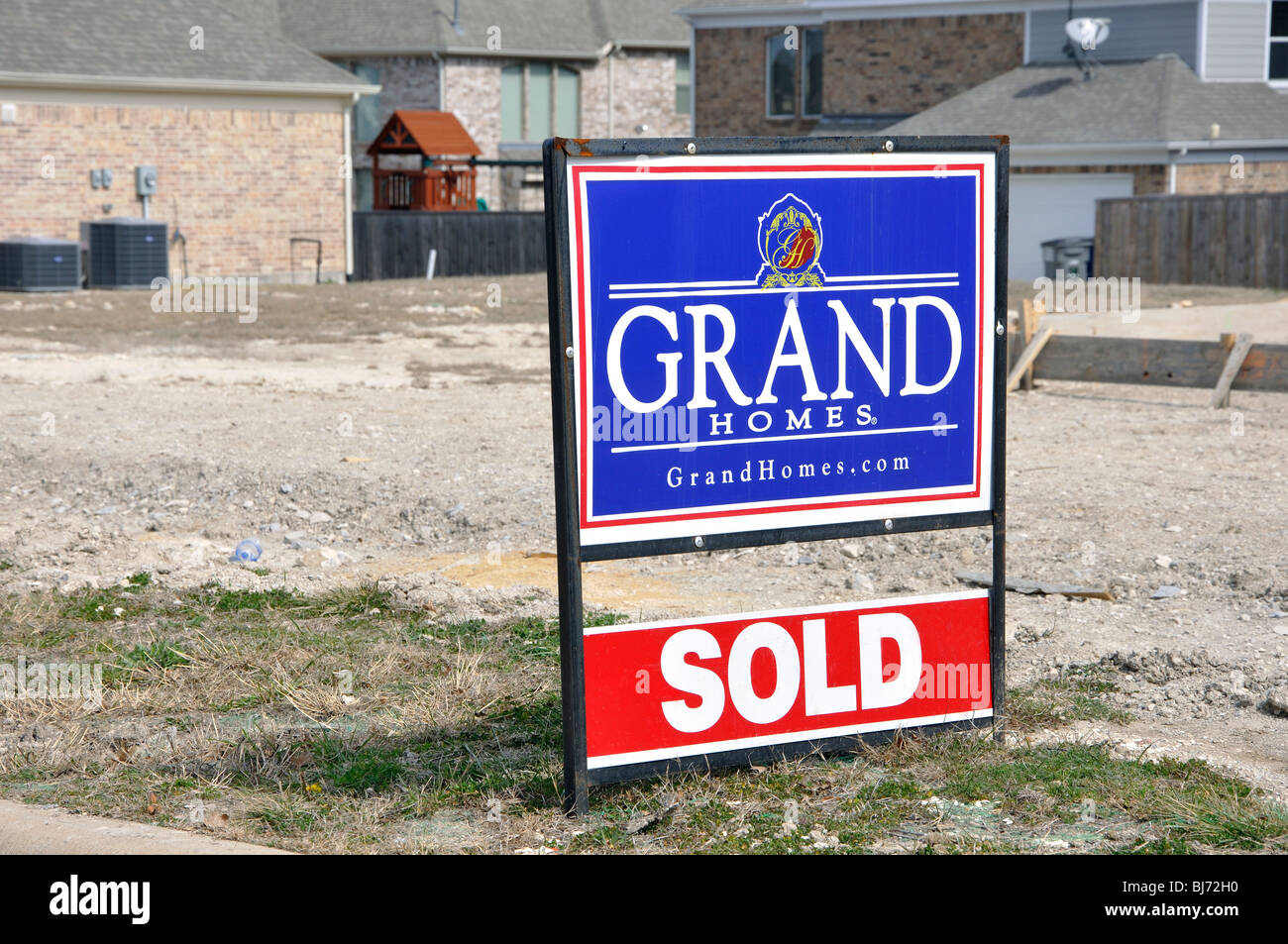 Lot for house to be constructed SOLD sign Stock Photo - Alamy