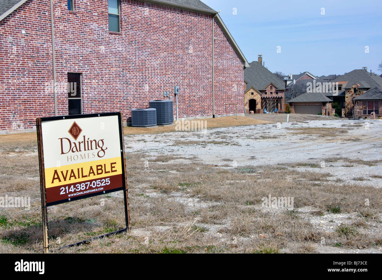 AVAILABLE sign on lot for house to be constructed Stock Photo - Alamy
