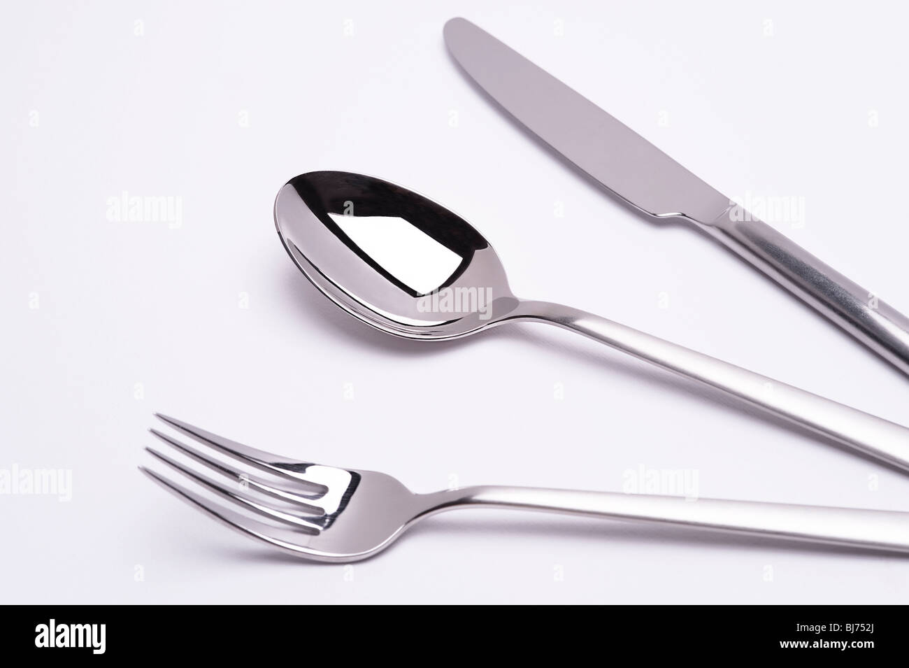 cutlery set isolated over white background Stock Photo - Alamy