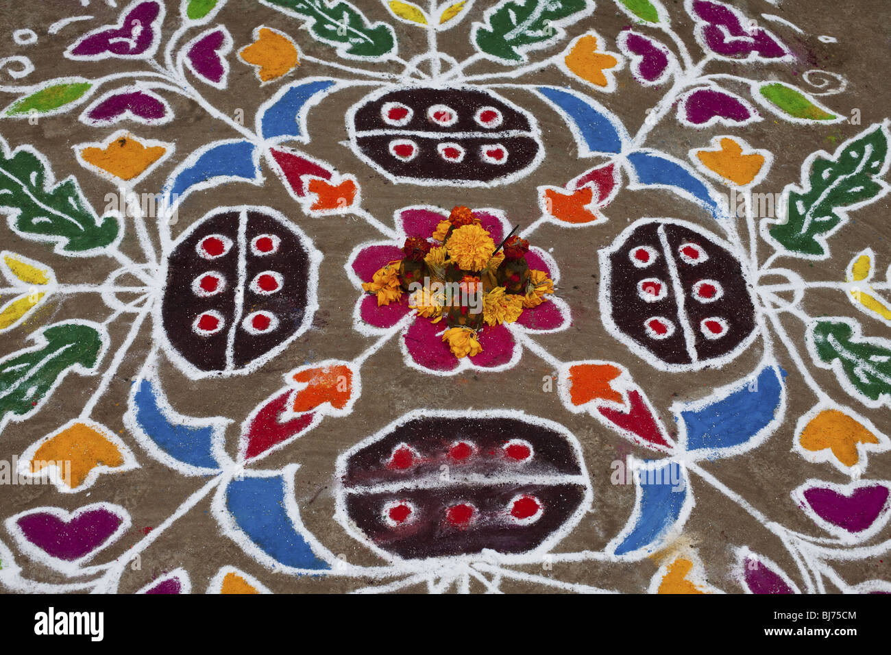 Rangoli festival designs in an Indian street made at the Hindu festival ...