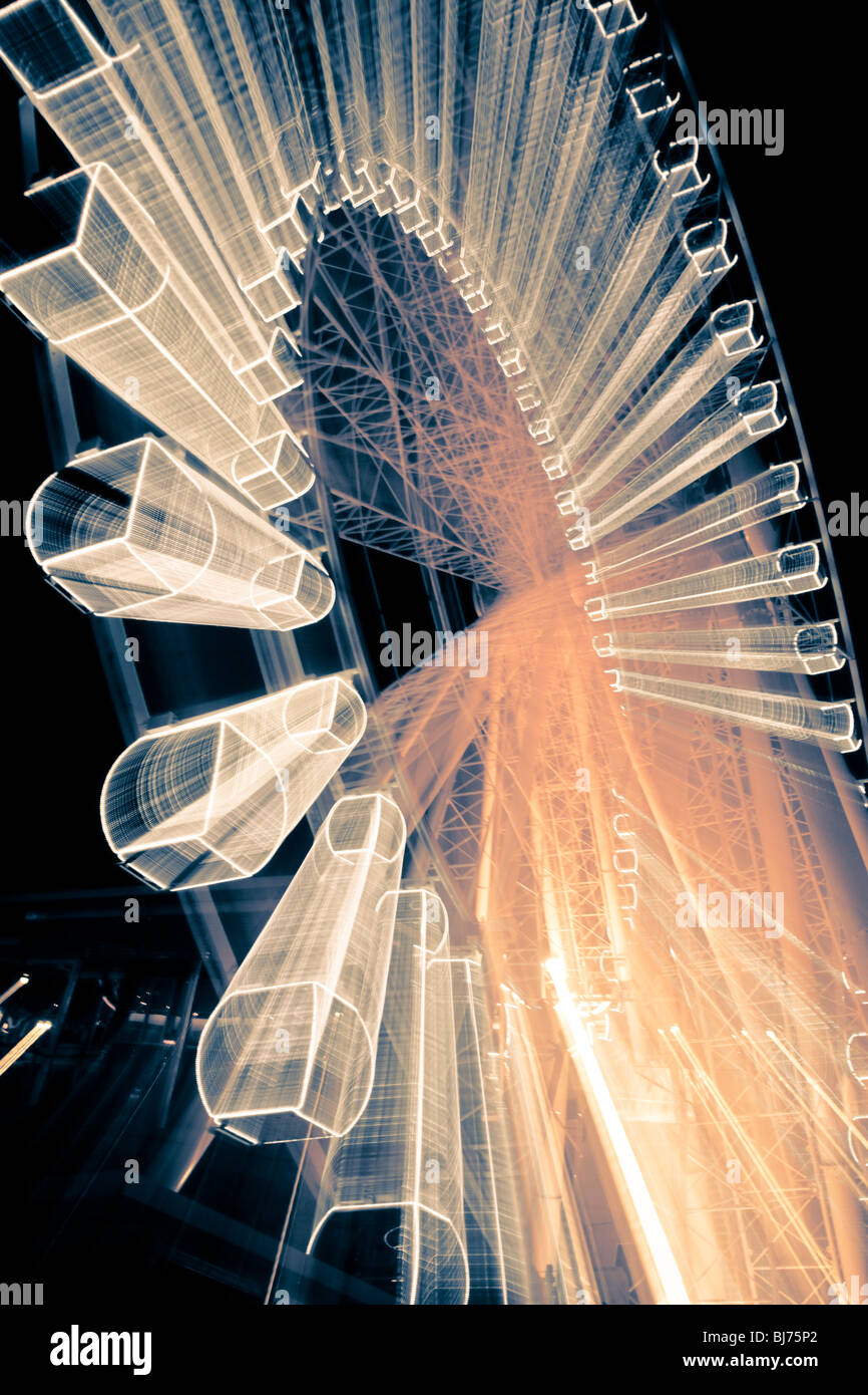 Sky wheel illuminated at night Stock Photo - Alamy