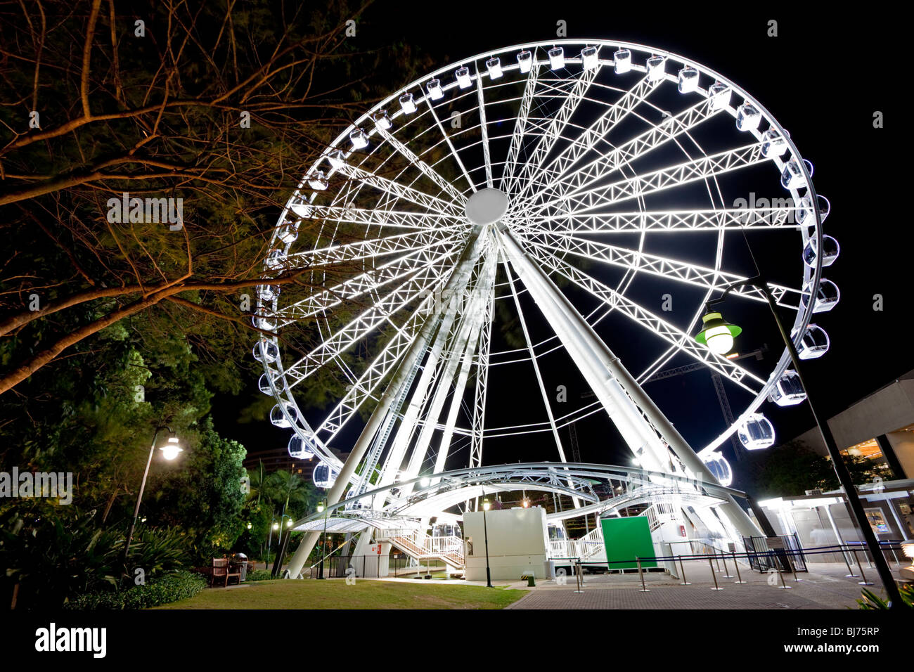 Sky wheel illuminated at night Stock Photo - Alamy