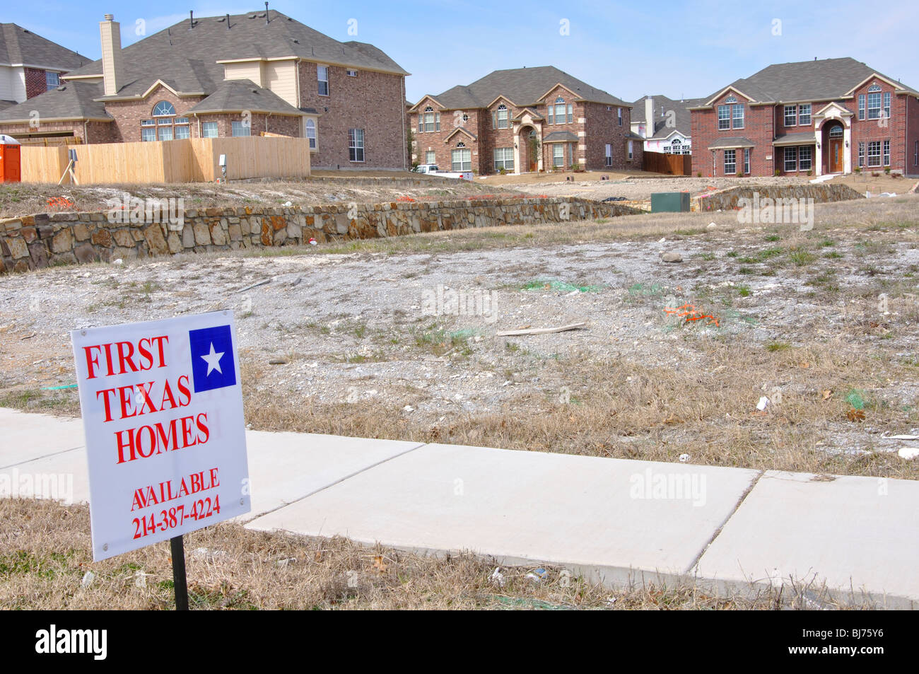 AVAILABLE sign on lot for house to be constructed Stock Photo - Alamy