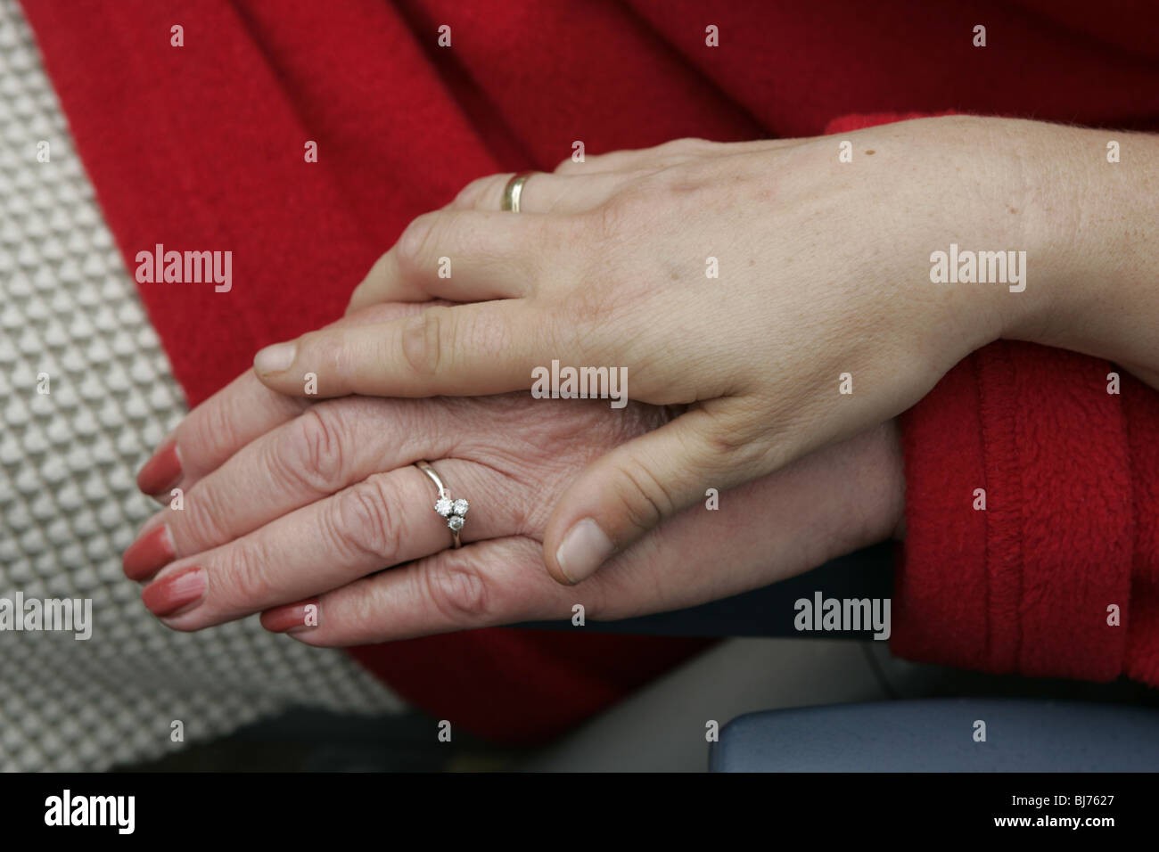 Comforting hand 2 people hi-res stock photography and images - Alamy