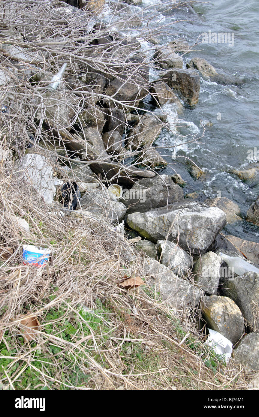 Trash washed up Stock Photo - Alamy
