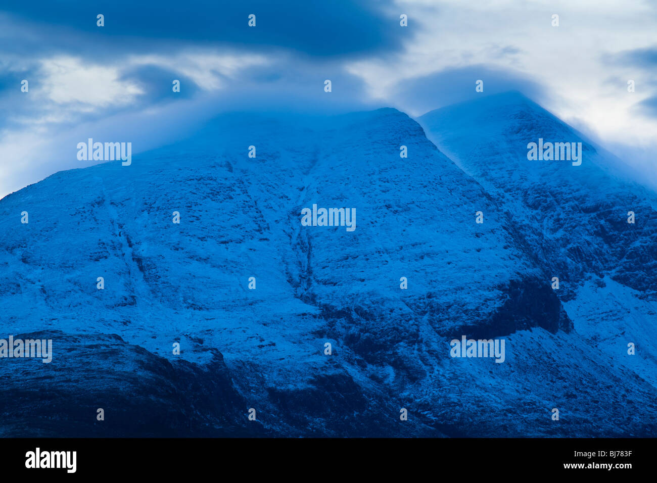 Scotland, Scottish Highlands, Assynt. Clouds clear from the peak of Cùl ...
